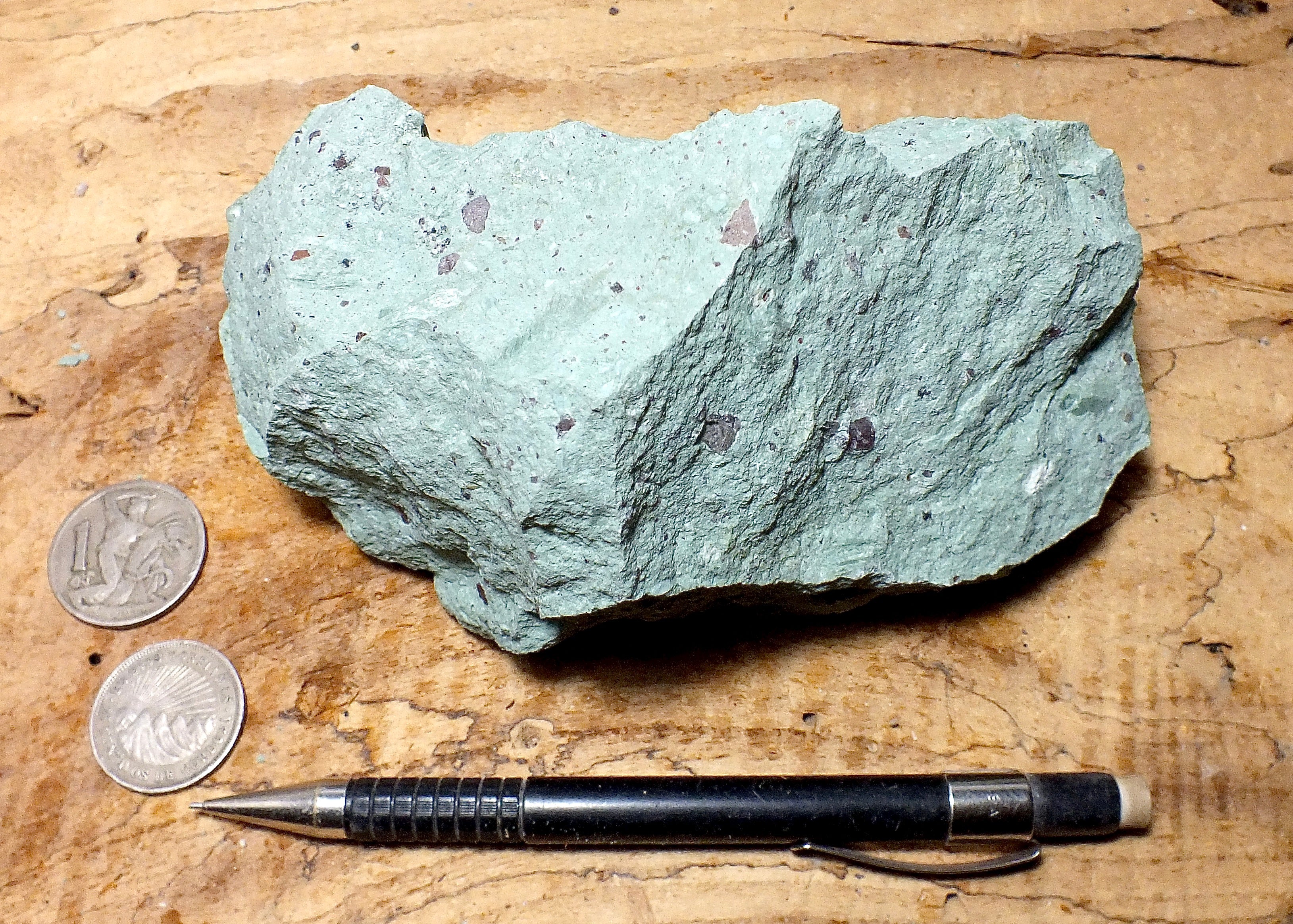 tuff - copper-stained green welded tuff - teaching hand/display specim ...