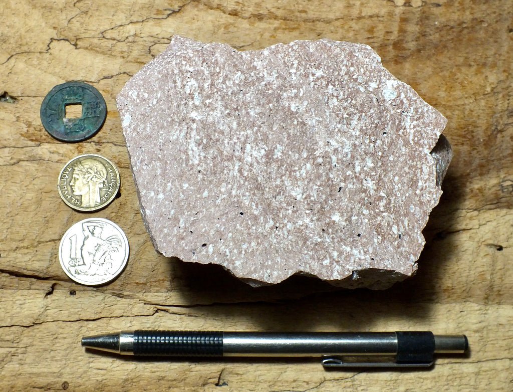 rhyolite porphyry - light pink rhyolite with small phenocrysts - hand ...